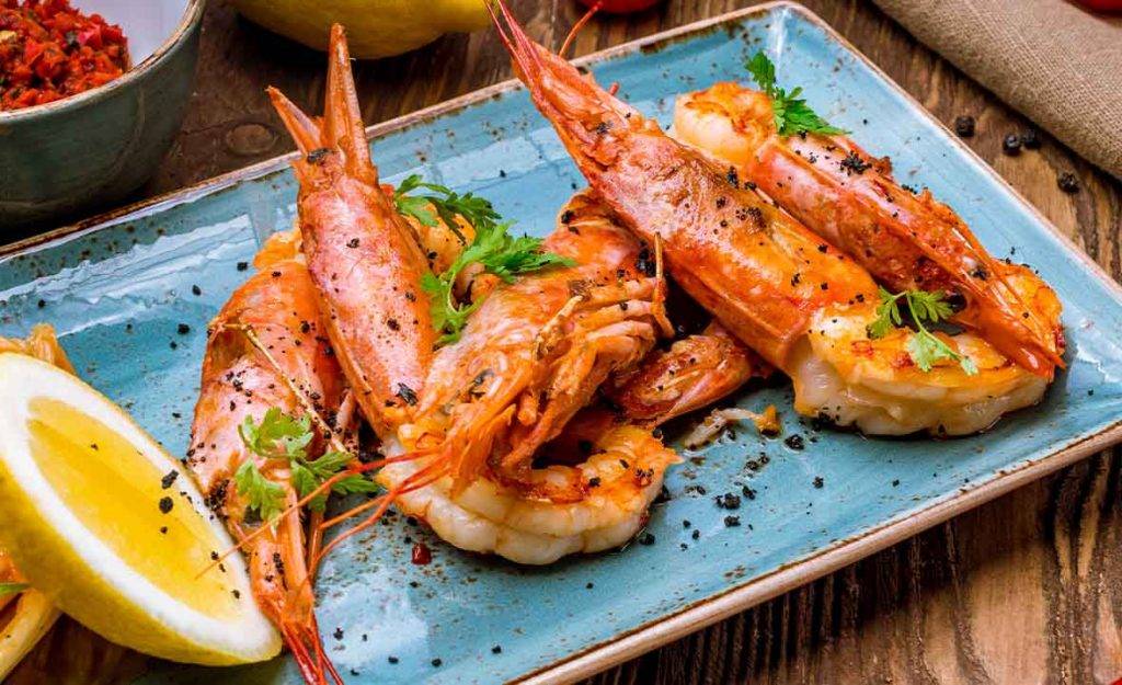 Gamberoni all'arancia al forno, raffinato e gustoso secondo