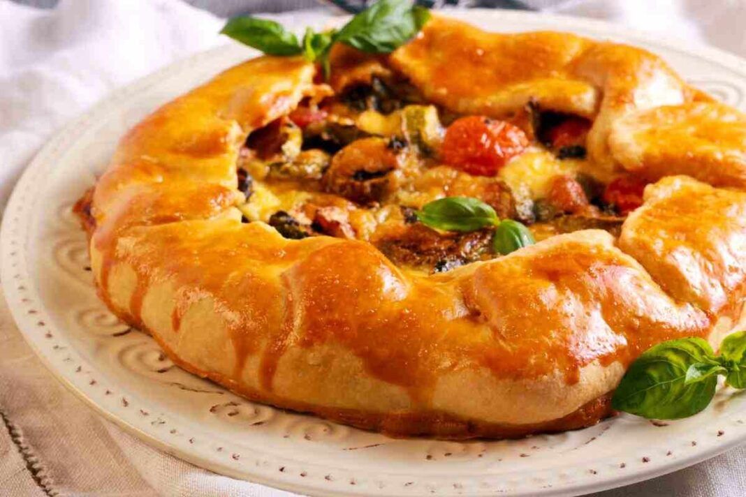 Torta salata al pesto, pomodorini e mozzarella si fa in pochissimo ed ...